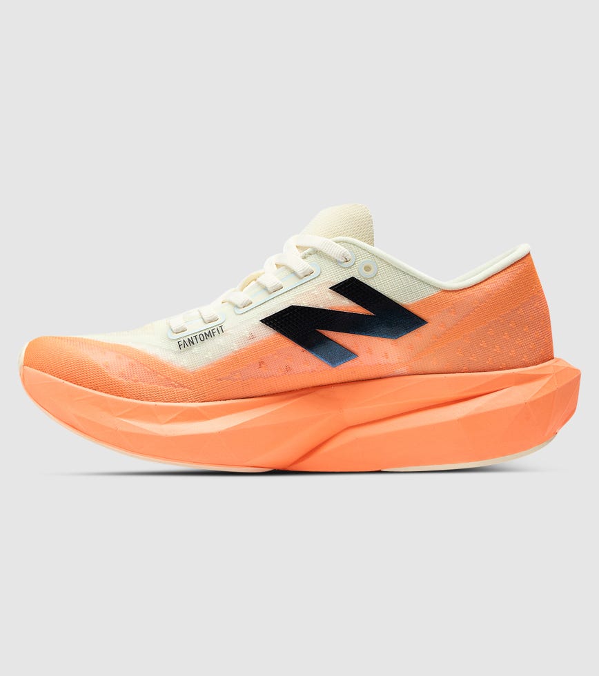 NEW BALANCE REBEL V4 WOMENS HOT MANGO | The Athlete's Foot