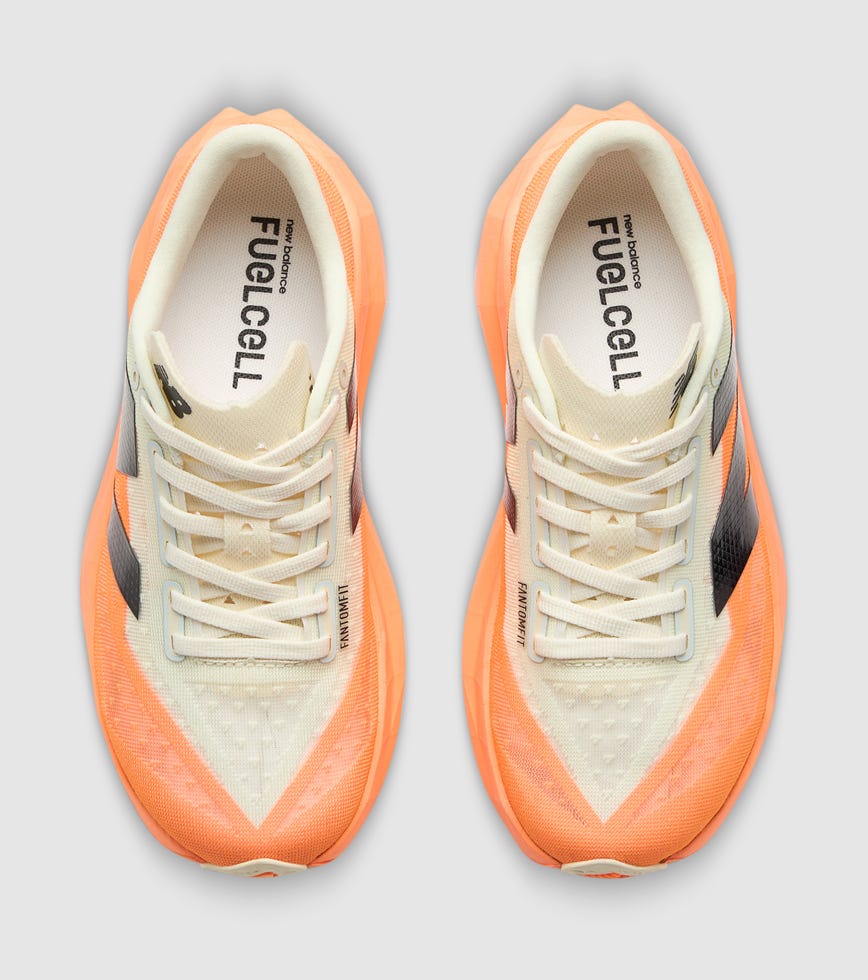 NEW BALANCE REBEL V4 WOMENS HOT MANGO | The Athlete's Foot